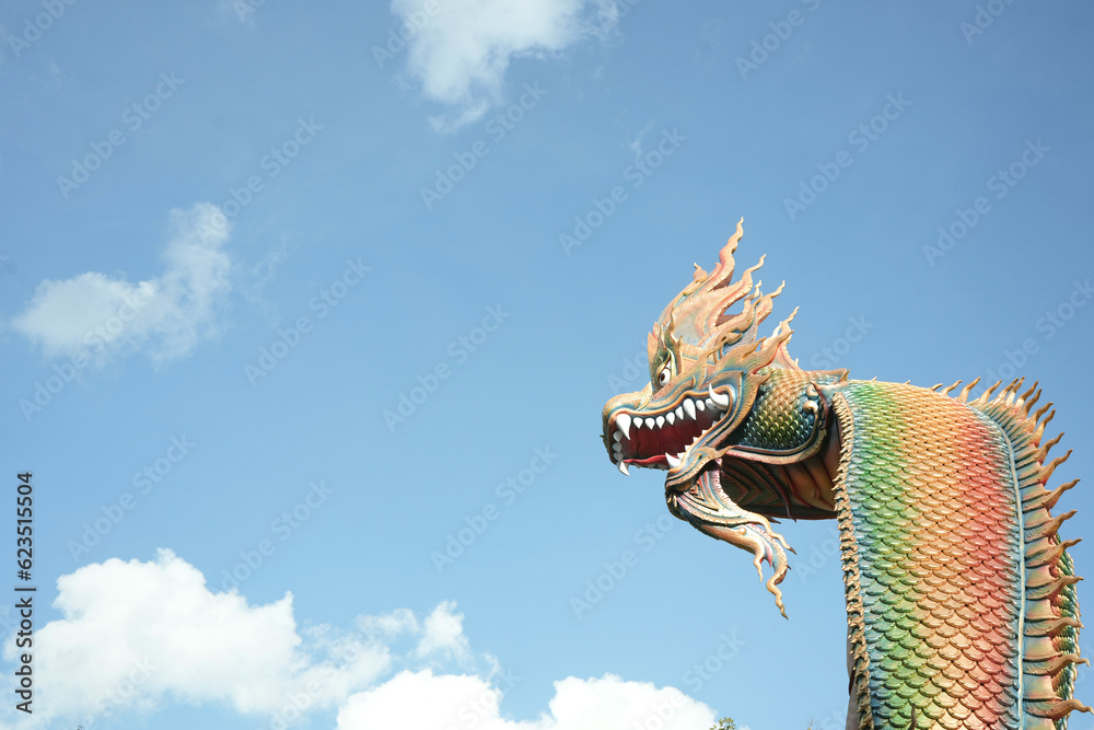 serpent head sculpture with blue sky background Stock Photo | Adobe Stock