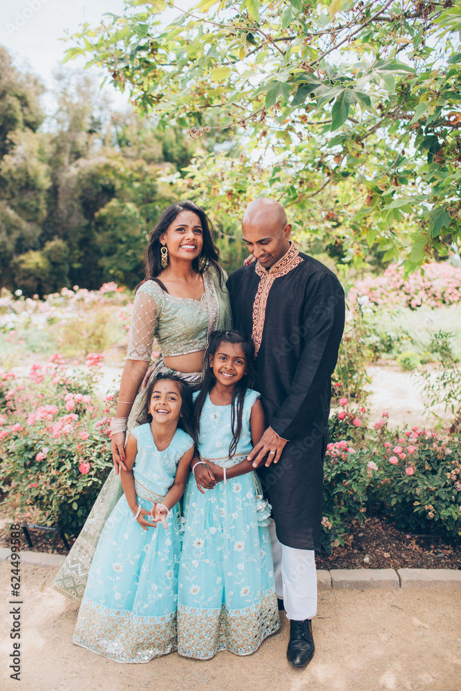 beautiful indian family with daughters girls sisters hugging in close ...