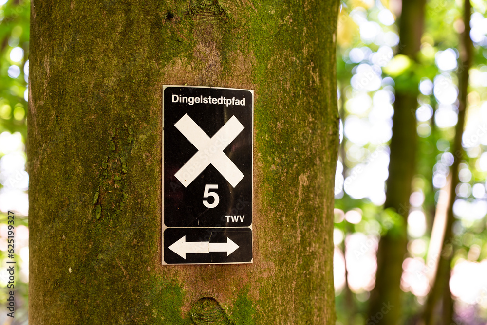 Trail marker signs for the "X5 Dingelstedtpfad" long distance hiking ...