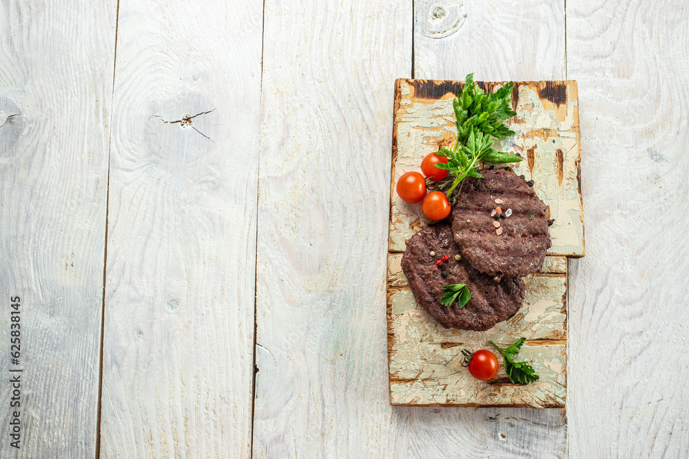grilled hamburger patties on a light background, banner, menu, recipe ...