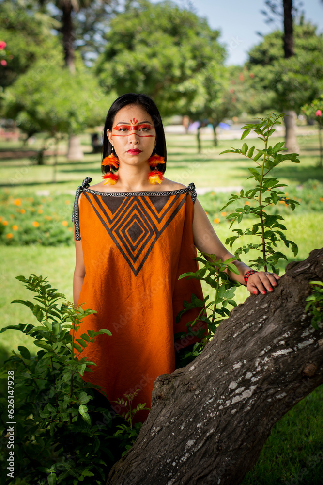 beautiful young peruvian woman of the yanesha culture posing with ...
