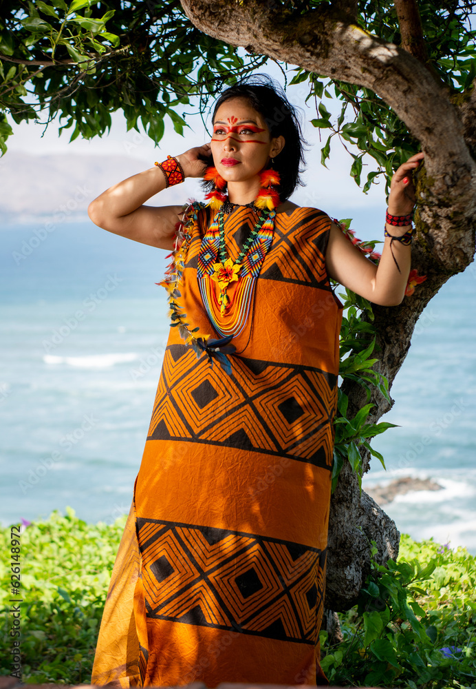 beautiful young peruvian woman of the yanesha culture posing with ...