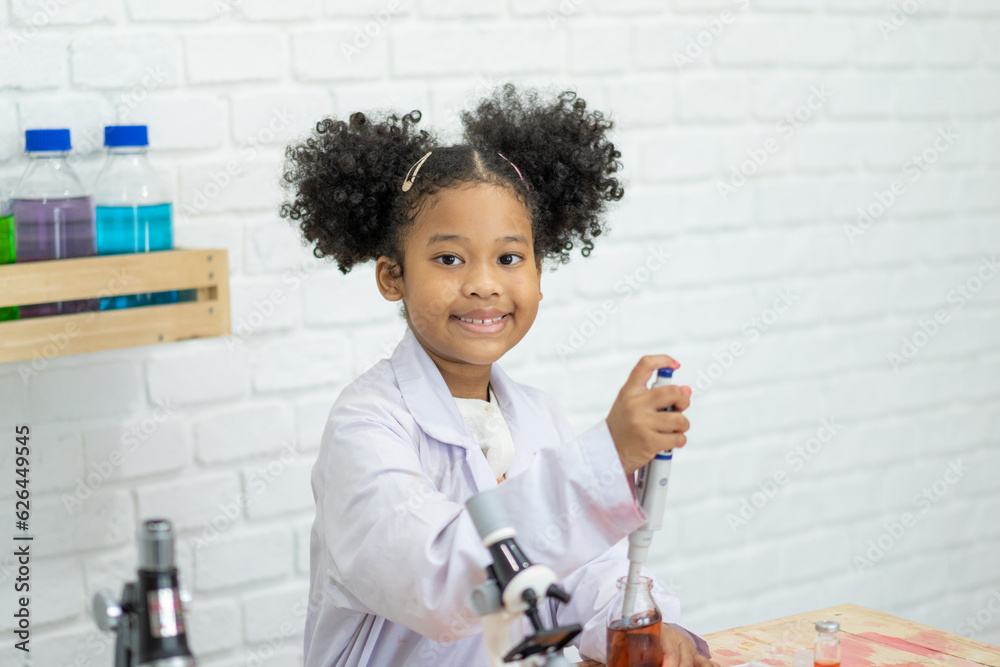 Portrait african of cute little scientist girl student learning Concept ...