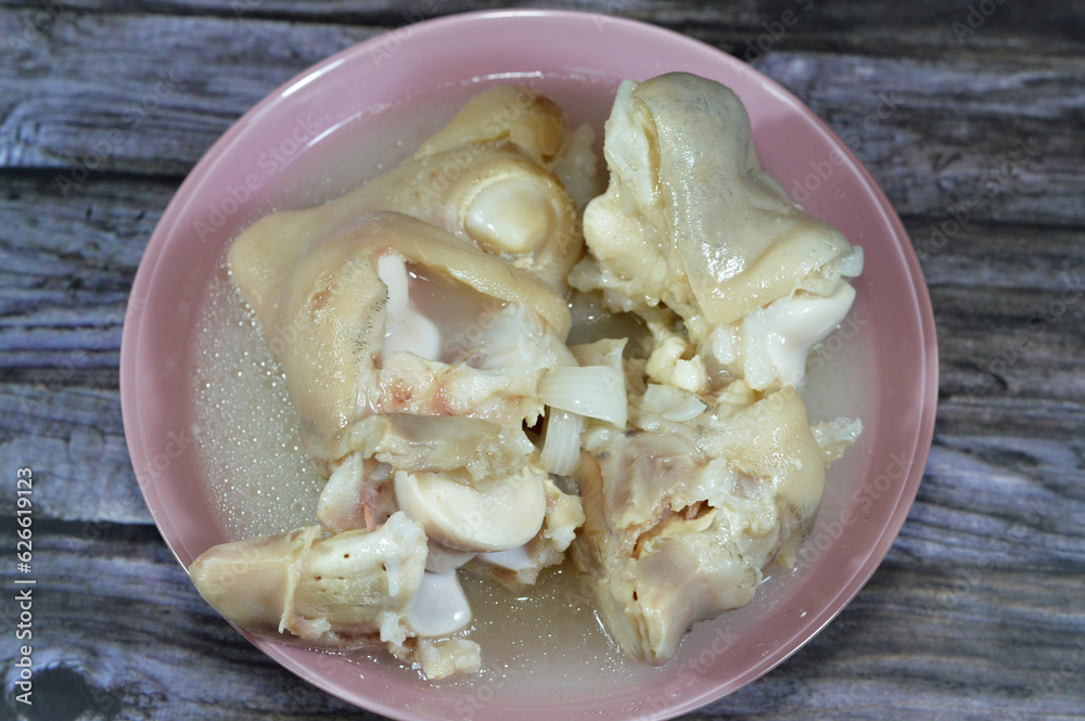 Arabic Egyptian cuisine of kawareh trotters with its traditional soup ...