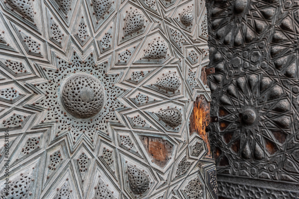 Beautiful Islamic geometric designed ancient wooden door of historical ...