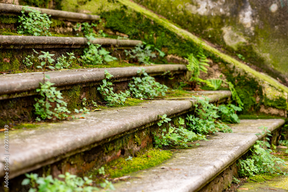 Steps of old weathered outdoor stairs made of concrete in old town of ...