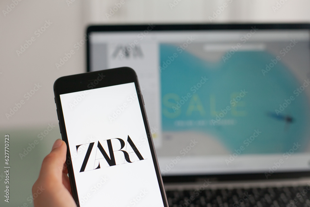 Zara logo on the screen of mobile phone. Inditex group brand identity ...