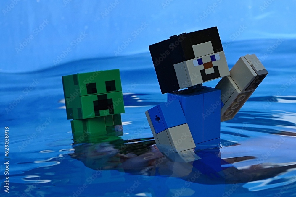 LEGO Minecraft figure of Steve swimming in a pool trying to escape ...