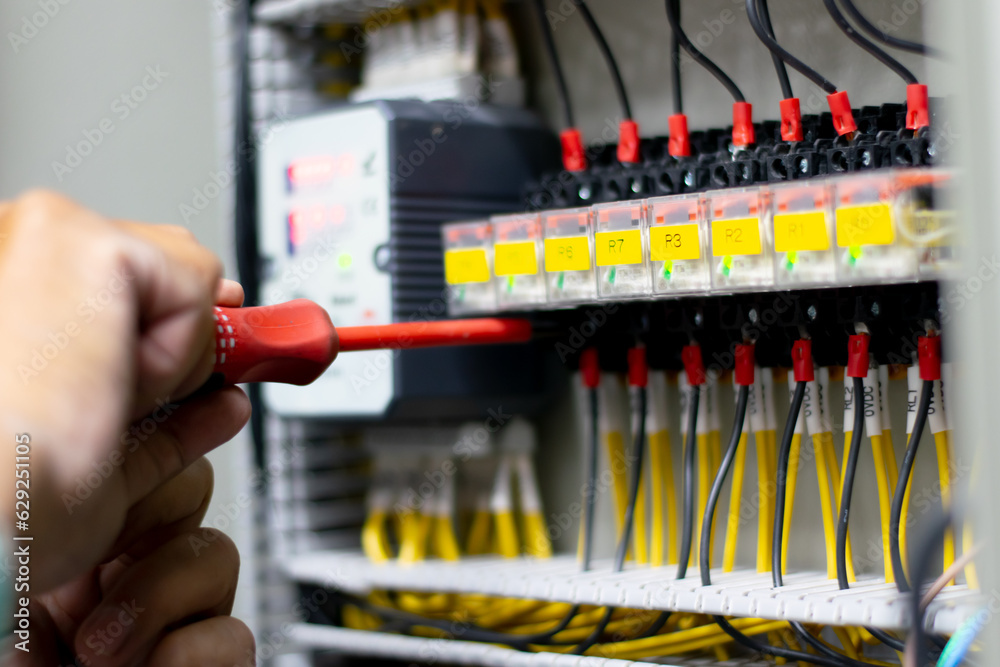 Electrician work tester measuring voltage and current of power electric ...