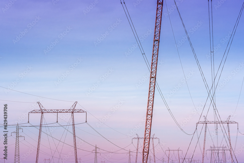 Electricity pylons transmission towers with overhead power lines in ...