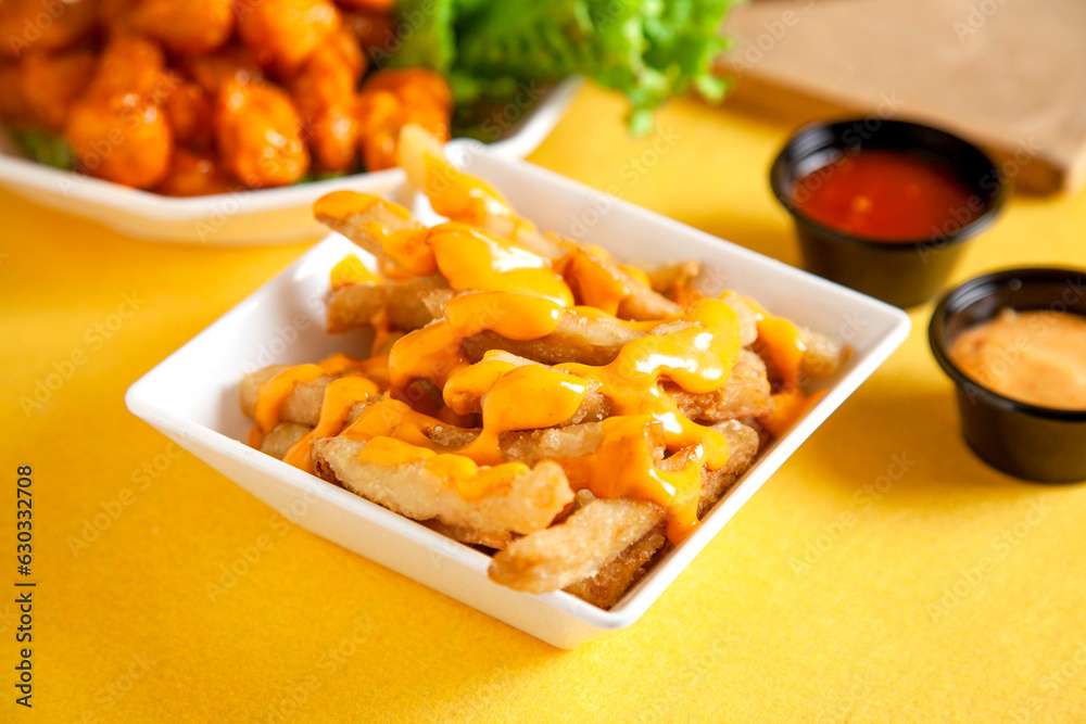 Poutine french fries potato chips topped with dynamite thousand island ...