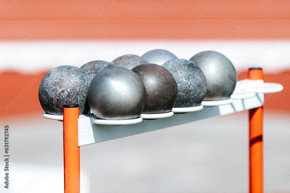 Shot put prepared for competition. Track and field background ...