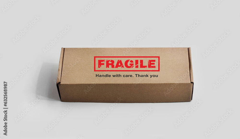 A rectangular cardboard box. Monochrome light background. An adhesive ...