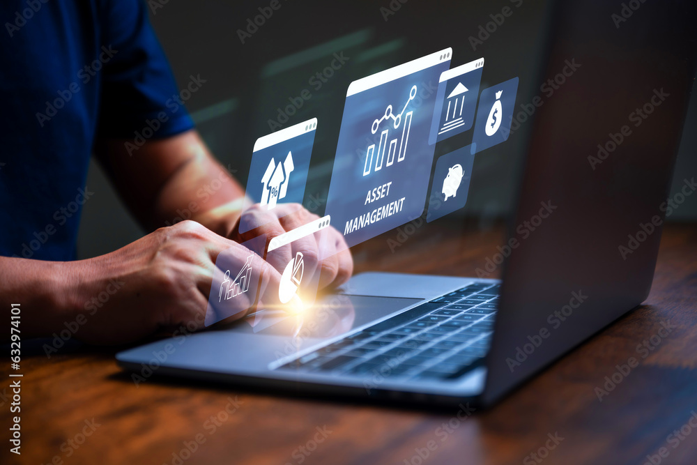 Asset management concept, Man using laptop with word asset management ...