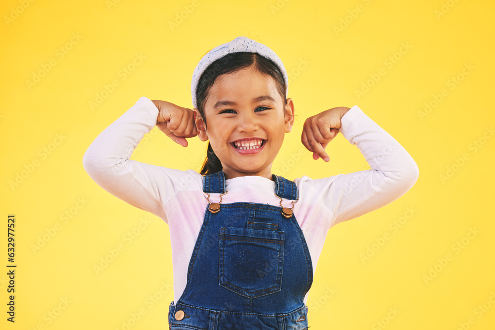 Smile, portrait and girl child with arm flex in studio for confidence ...