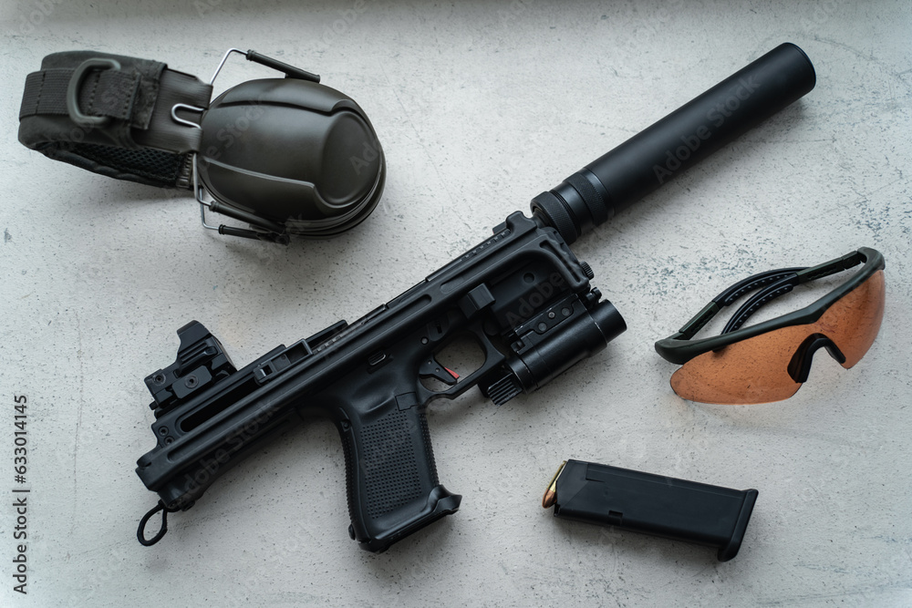Modern weapons. Tactical pistol with folding stock and red dot sight ...