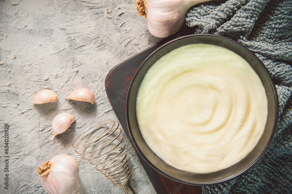 Arabic Cuisine; Traditional Lebanese garlic dip "Toum or Toumya". It is ...