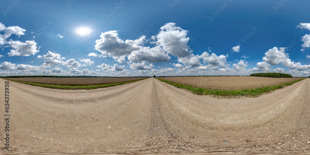 360 hdri panorama on wet gravel road with marks from car or tractor ...