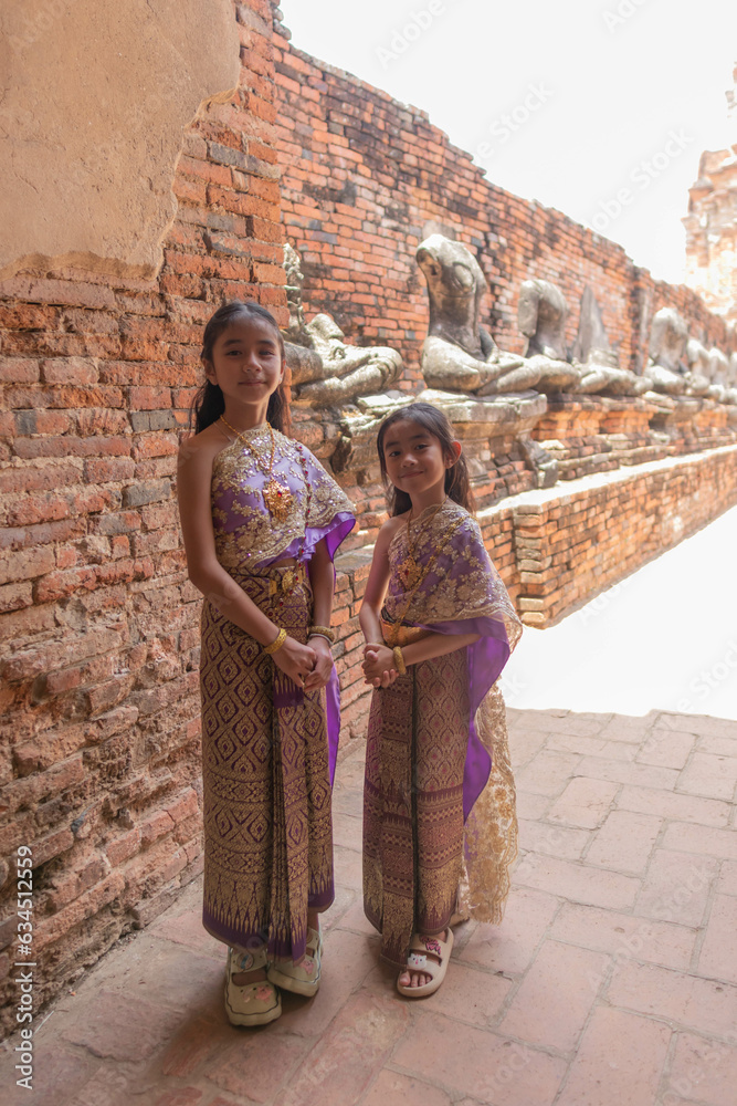 little girl Thai traditional dress with ancient ruin Stock Photo ...
