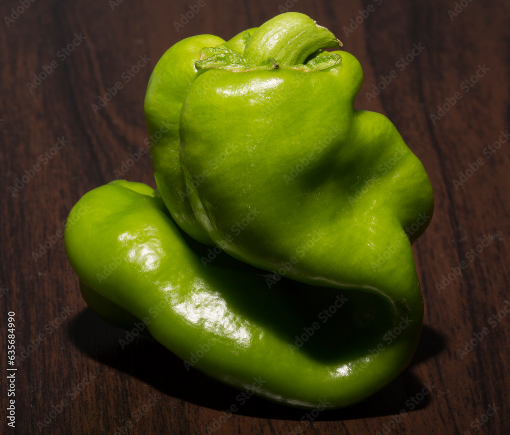 Green bell pepper (also known as sweet pepper, or capsicum) is the ...