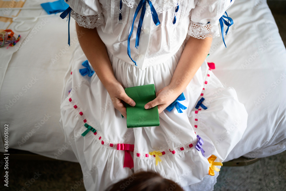 Anonymous Girl in traditional dress Stock Photo | Adobe Stock
