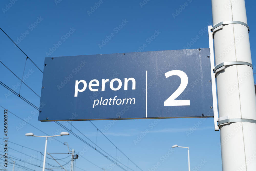 Blue railway station sign in Poland. Train platform number information ...