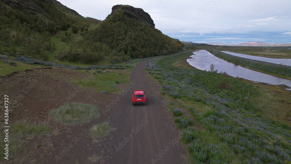 Stock-Foto „4X4 car driving on a country road in Þjórsardalur valley ...