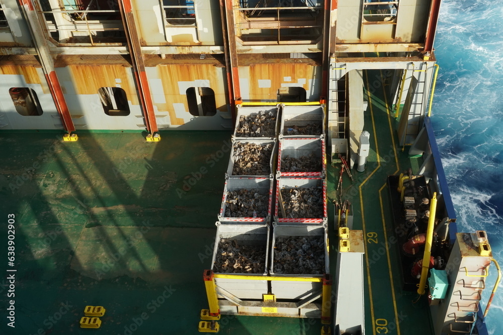 Flat rack container for lashing bins filled with twist locks used to ...