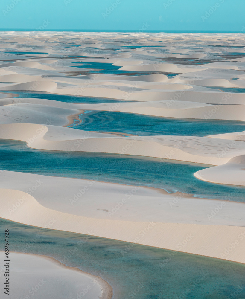 Aerial view of Lencois Maranhenses. White sand dunes with pools of ...