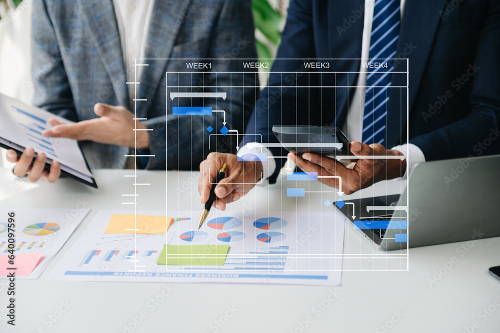 Project manager working and update tasks with milestones progress ...