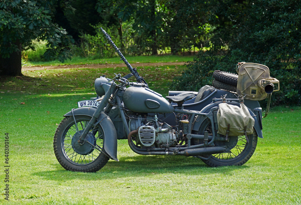 Vintage German WW2 motorcycle and sidecar isolated on grass Stock Photo ...