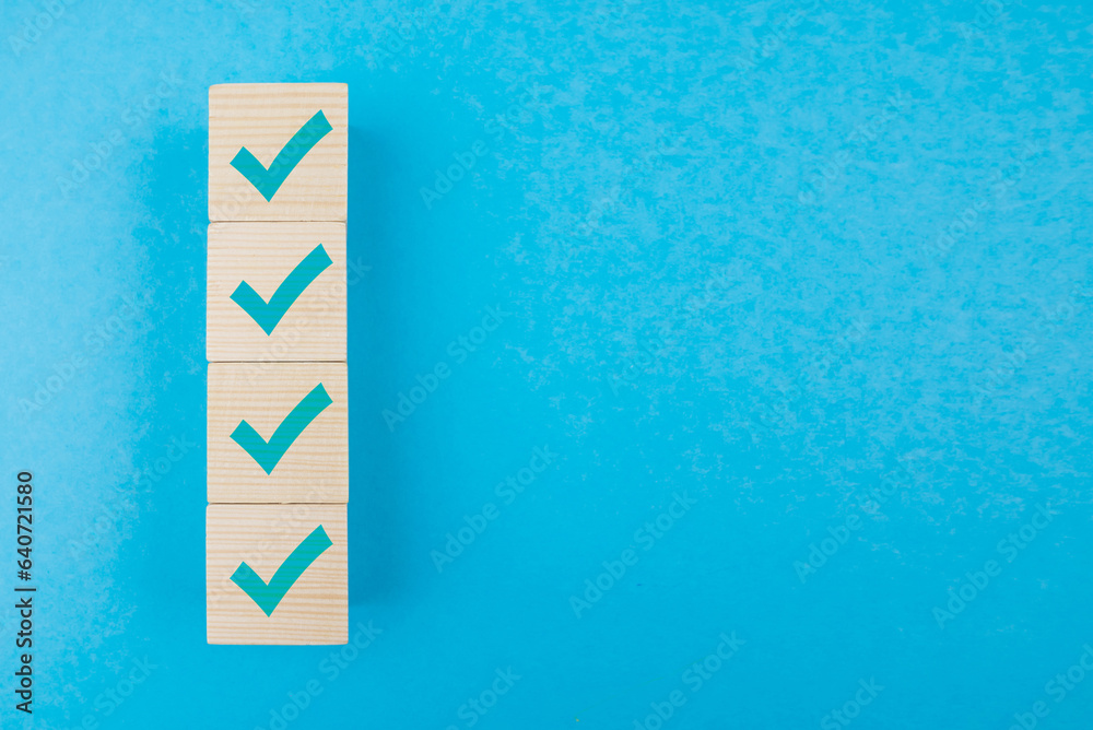 Checklist concept, check mark on wooden blocks, Stock Photo | Adobe Stock