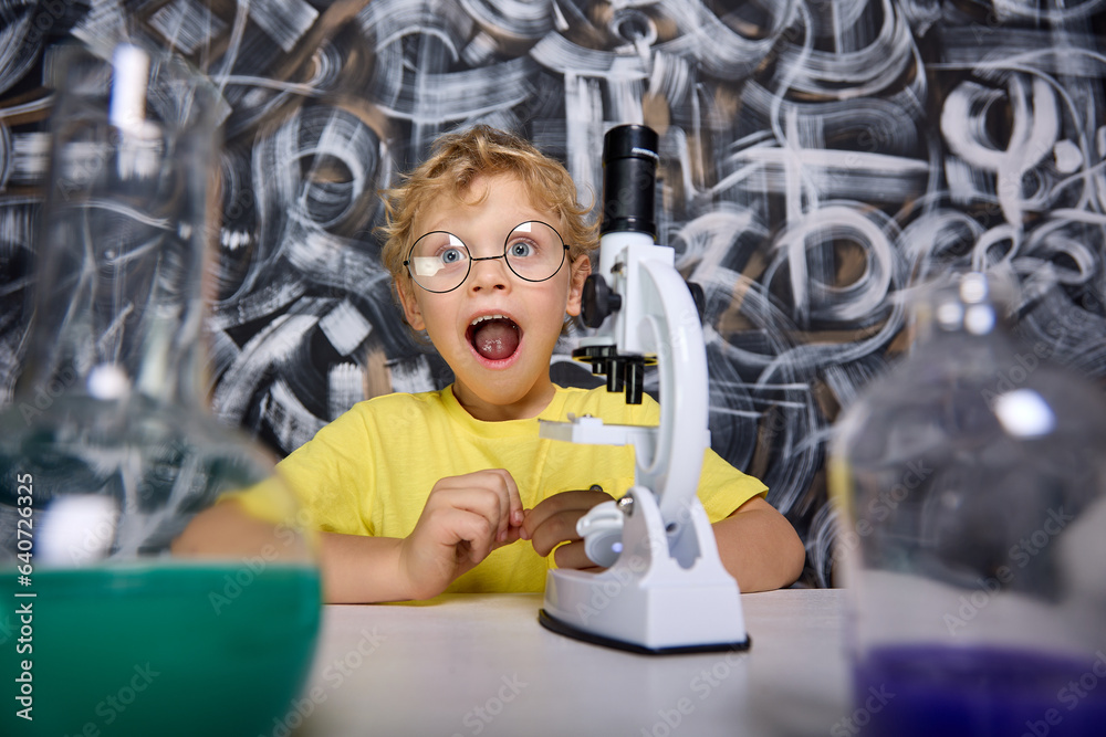 Cute little scientist makes his first scientific discoveries with help ...