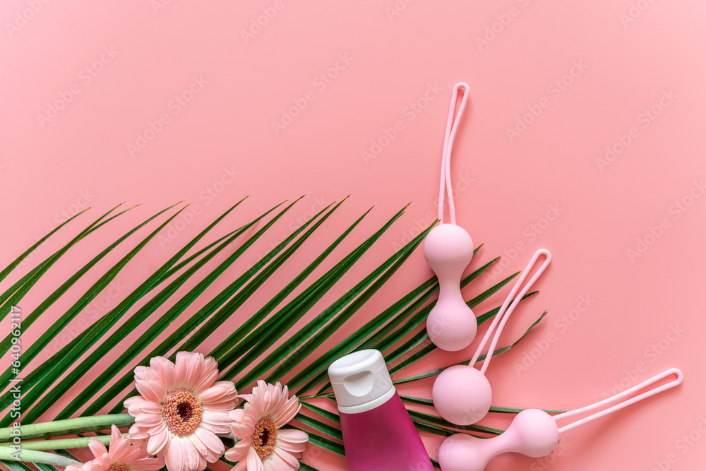 Pink balls and lubricant for special exercises for woman. Balls for ...