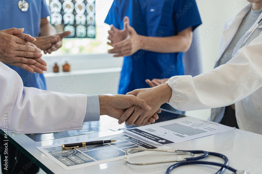 Doctors and nurses join hands and collaborate at hospitals, working ...