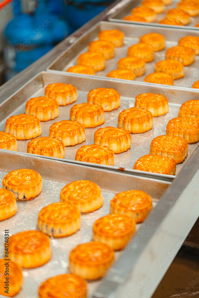 Mooncake making process. A mooncake is a Chinese bakery product ...
