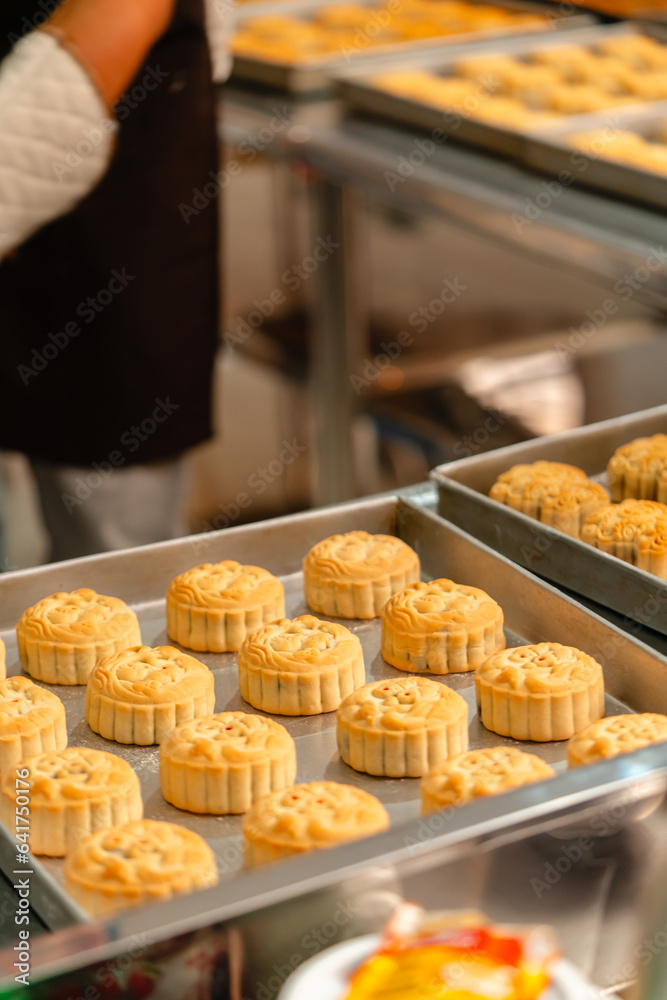 Mooncake making process. A mooncake is a Chinese bakery product ...
