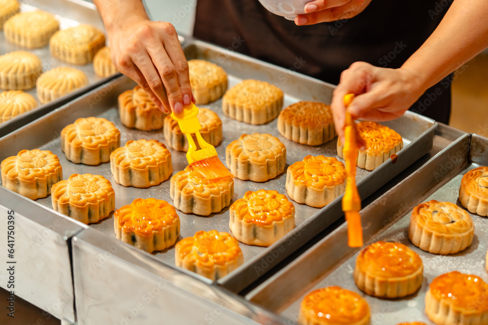 Foto de Stock Mooncake making process. A mooncake is a Chinese bakery ...