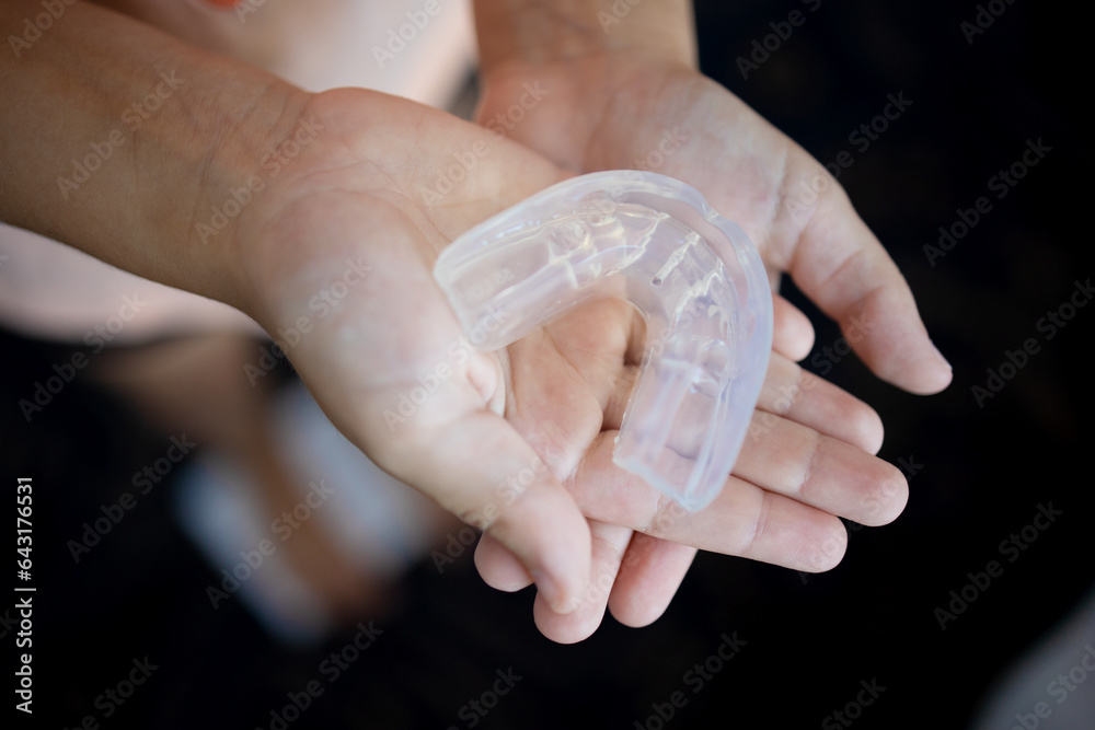 transparent mouth guard made of silicone, for straightening teeth in ...