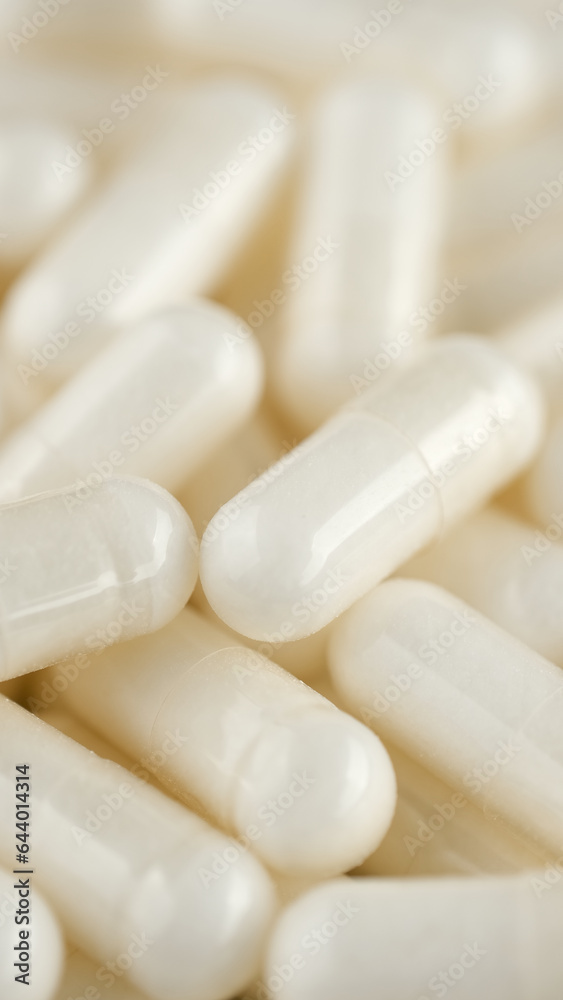 White capsule. Collagen capsule Stock Photo | Adobe Stock