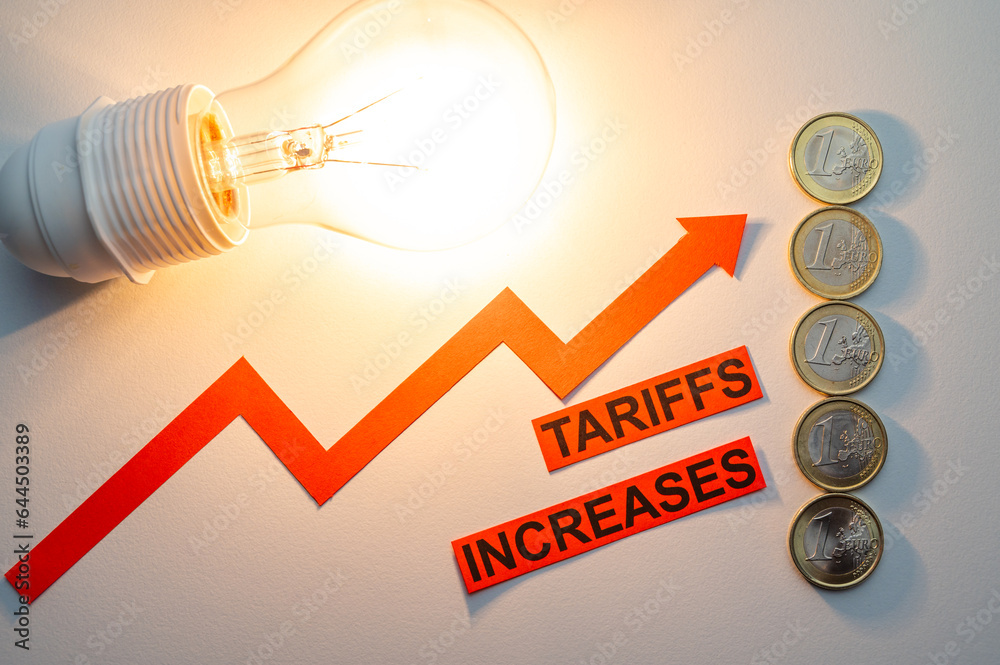 Illuminated light bulb, next to coins and ascending line, and text ...