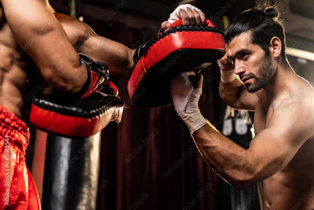 Asian and Caucasian Muay Thai boxer unleash upper cut punch attack in ...