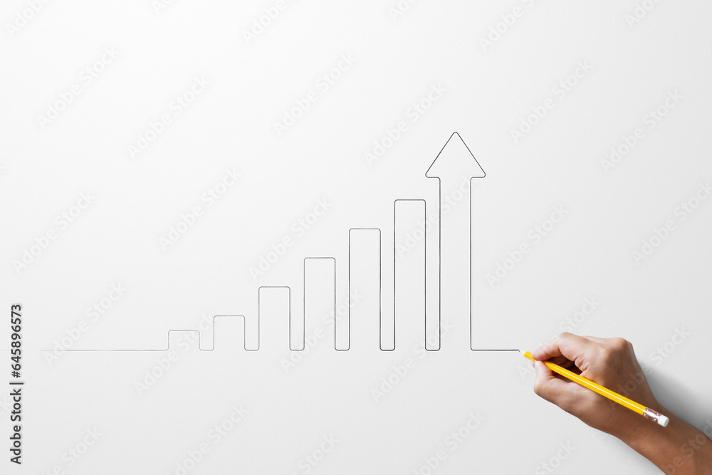 Hand holding yellow colour pencil sketch outline arrow graph growing on ...