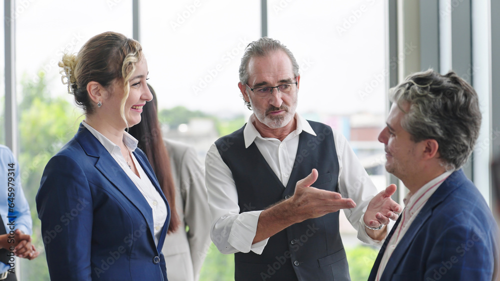 Caucasian man leader introducing woman manager to new team partner at ...