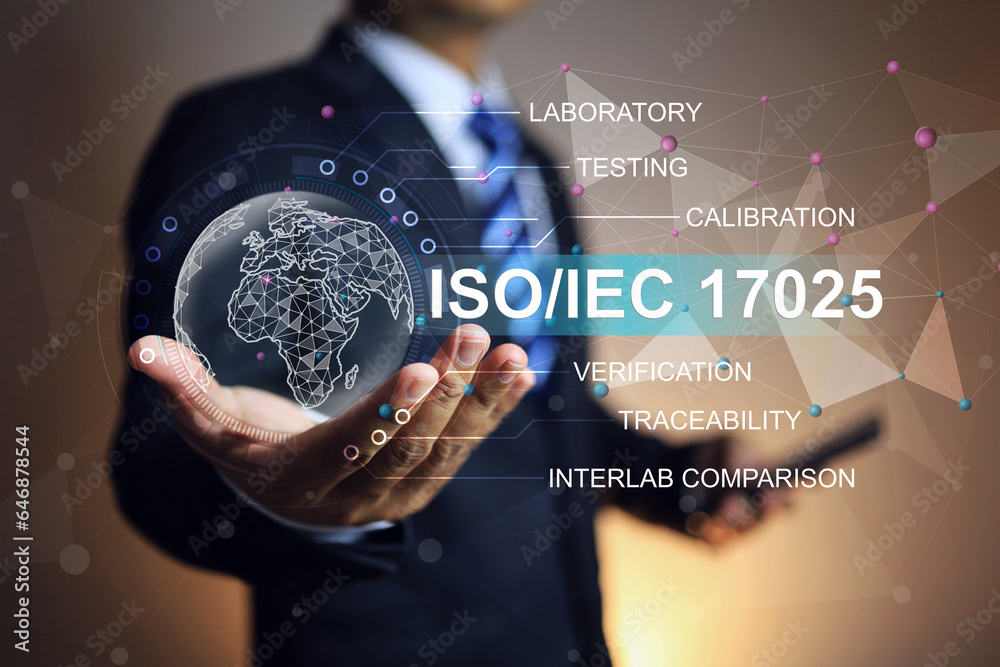 Businessman holding world of ISO IEC 17025 Laboratory management System ...