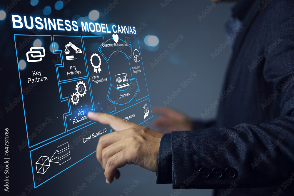 Businessman working on business model canvas virtual screen chart to ...