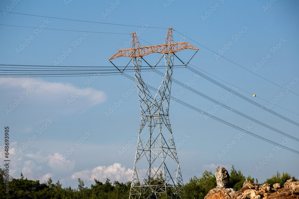 Symmetrical high voltage electricity poles Stock Photo | Adobe Stock