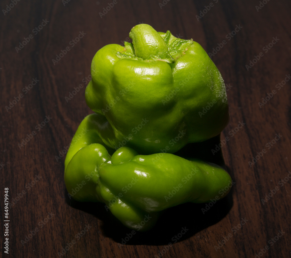 Green bell pepper (also known as sweet pepper, or capsicum) is the ...