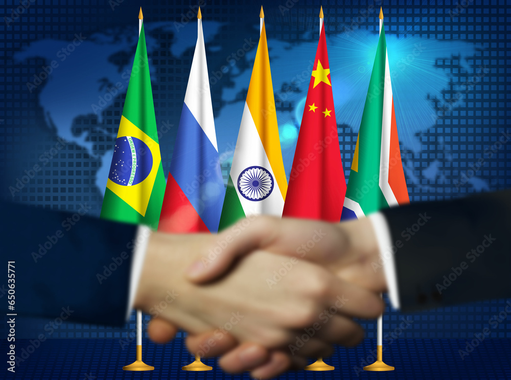 Two person shaking hands in front BRICS countries flags.Brazilian ...