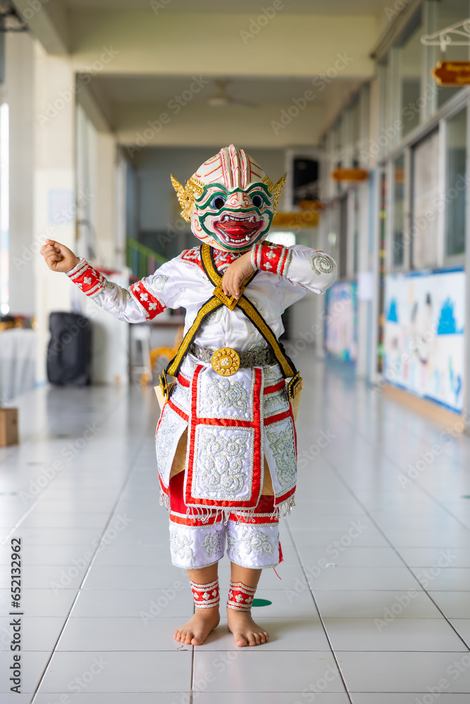 Happy and smile Asian boy wearing Hanuman Khon. Hanuman is Thailand ...